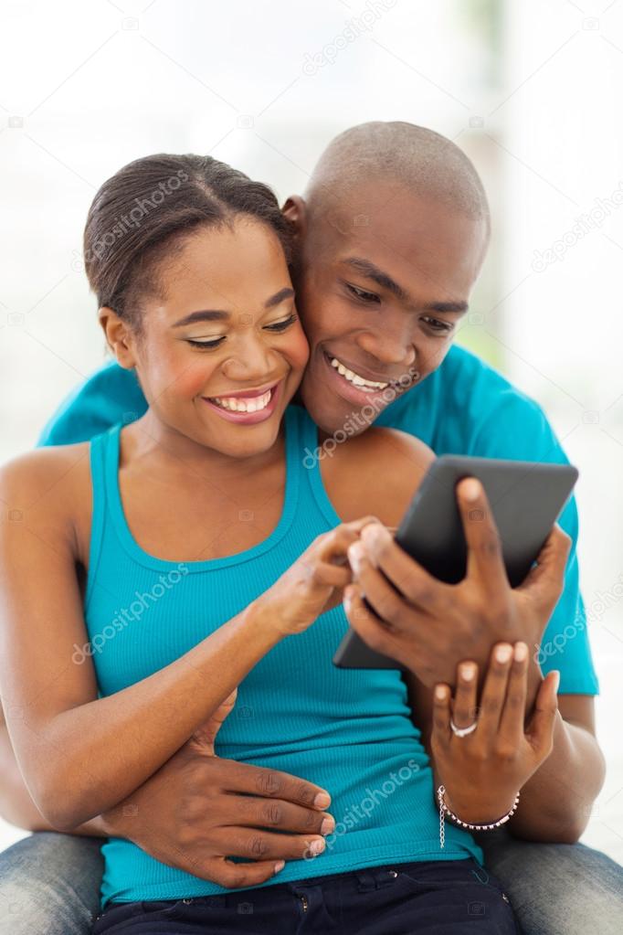 African american married couple using tablet computer Stock Photo by ... African american married couple using tablet computer Stock Photo by ...