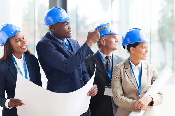 construction team discussing architectural project - Stock Image ...