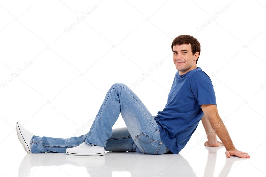 Relaxed man sitting on the floor Stock Photo by ©michaeljung 34426503