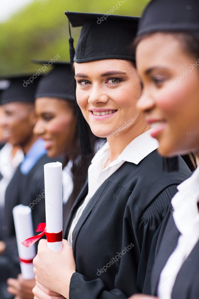 University graduate standing in a row Stock Photo by ©michaeljung 42488691