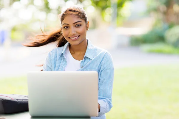 Indian student with laptop - Stock Image - Everypixel