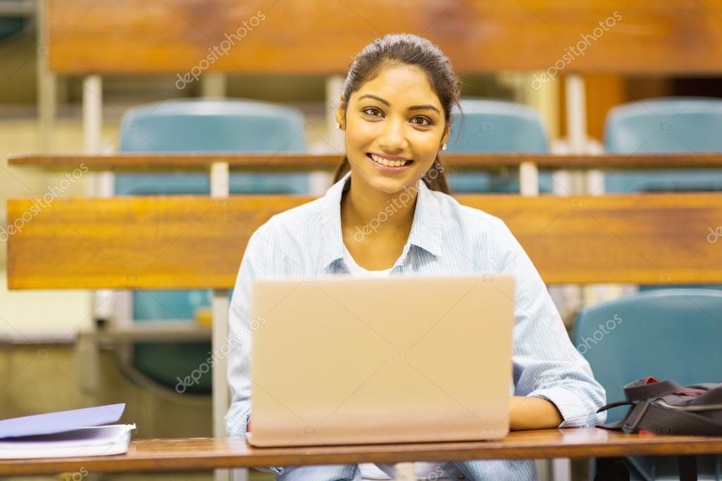Indian college student using laptop Stock Photo by ©michaeljung 47158183