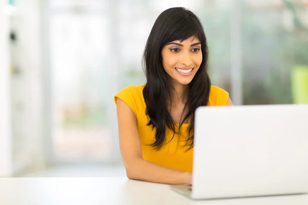 young indian woman using computer - Stock Image - Everypixel