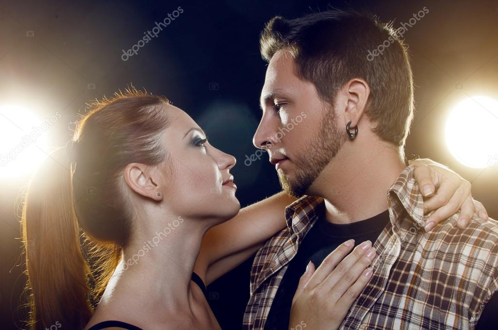 Beautiful young couple in love. The girl embraces the guy's neck Stock ...