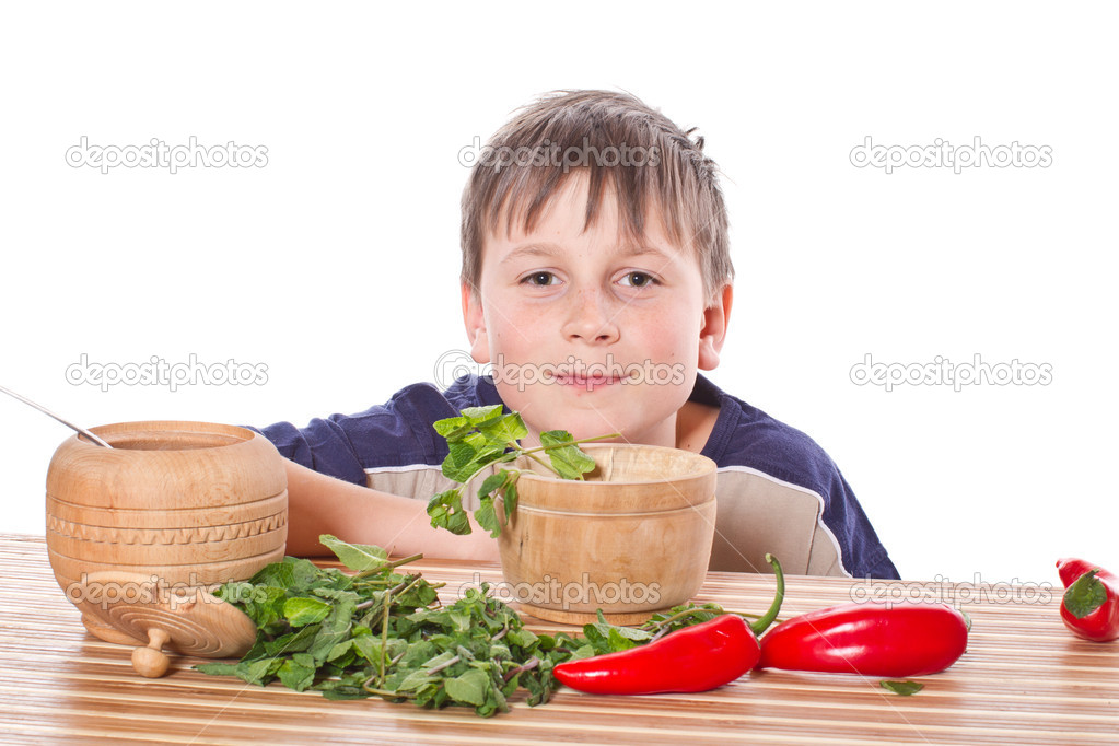 Boy preparing breakfast Stock Photo by ©Rawlik 19078021