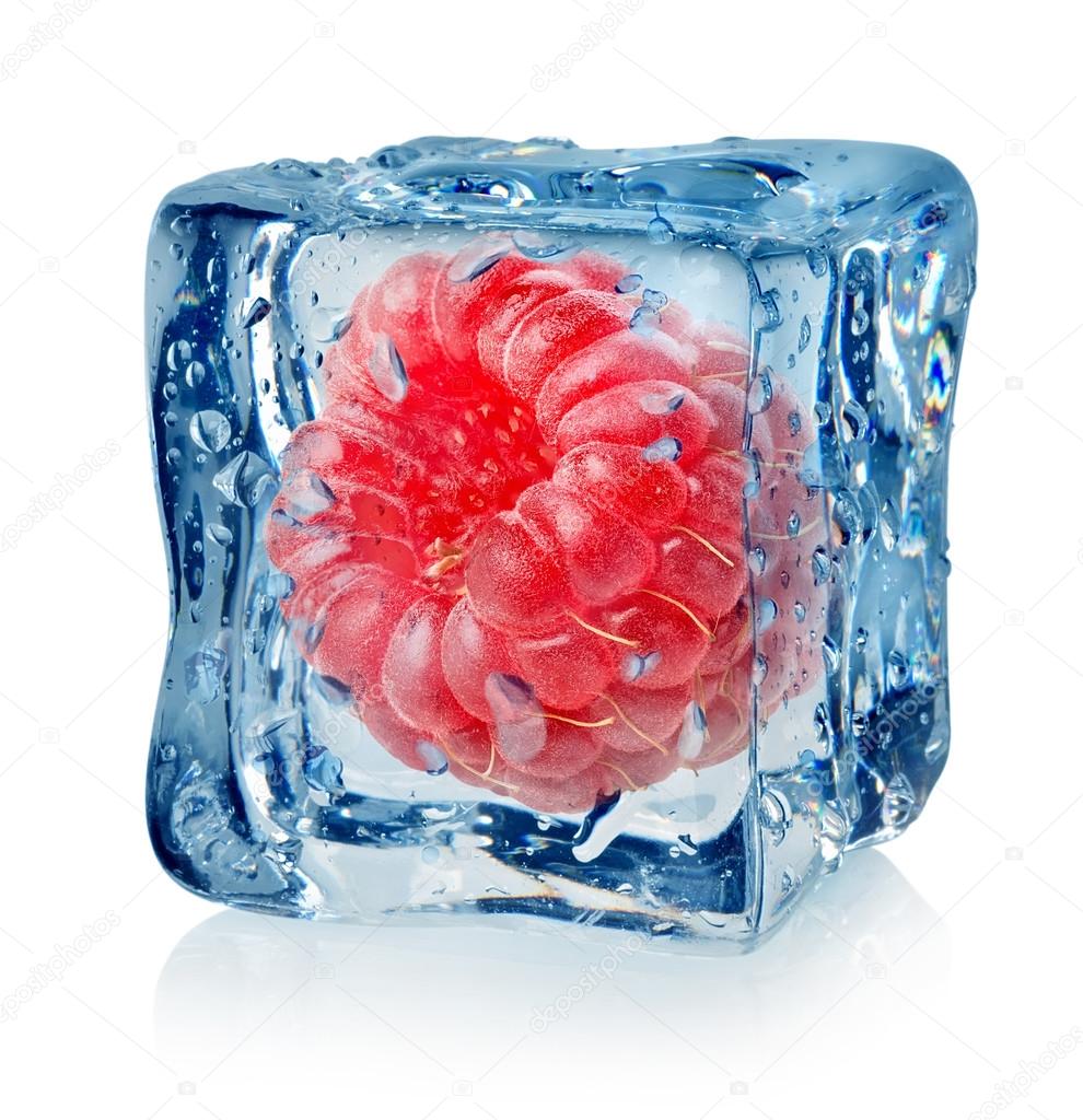 Berry raspberry in ice cube — Stock Photo © Givaga #31503797