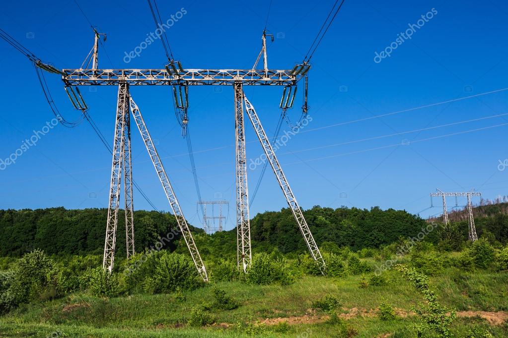 Power lines in a green field Stock Photo by ©alan64 47343341