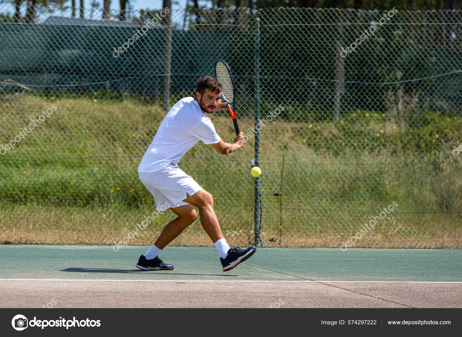 Tennis Player Hitting Backhand Ball Racket Court Stock Photo by ...