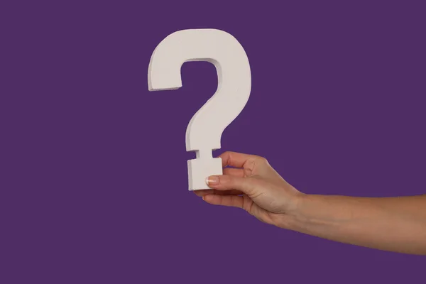 Female hand holding up a question mark from the left Stock Photo by ...