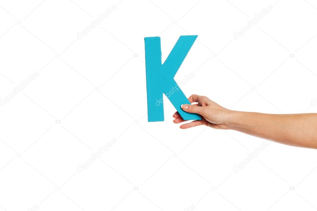 Hand holding up the letter K from the right Stock Photo by ©nelka7812 ...