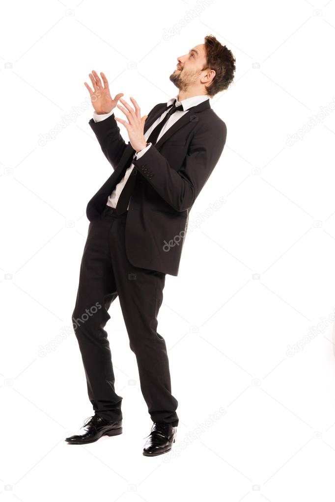 Photo: businessman reacts | Businessman reacting in shock and amazement ...