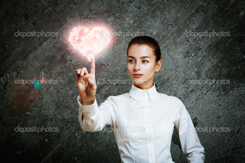 Woman Pointing at Glowing Pink Heart — Stock Photo © brickrena #38802725