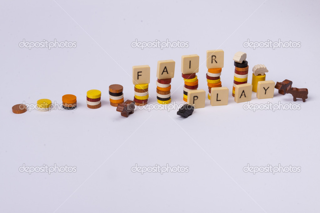 Fair play game - wooden column on white background. — Stock Photo ...