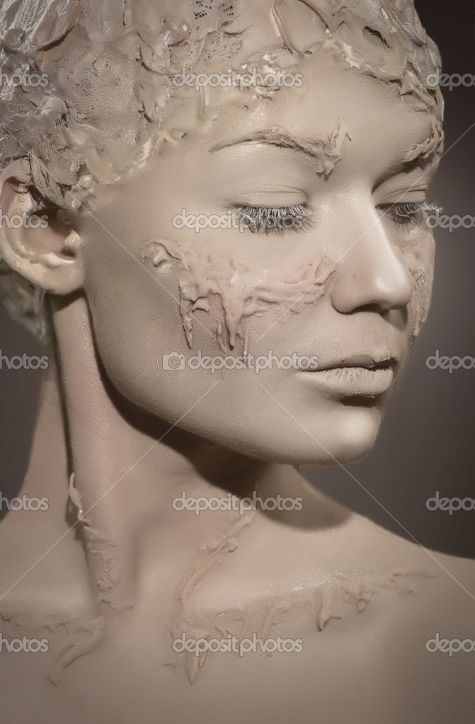 Woman smeared with clay Stock Photo by ©FlexDreams 27870777