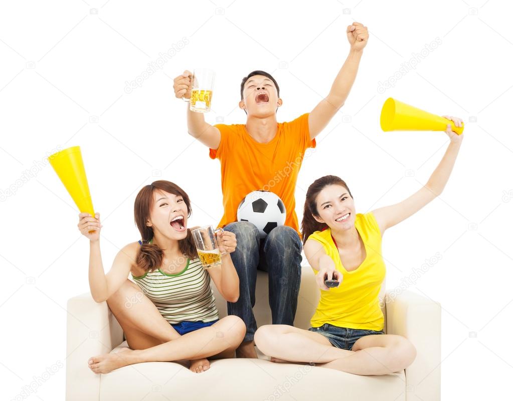 Young people shouting to encourage their team win Stock Photo by ...