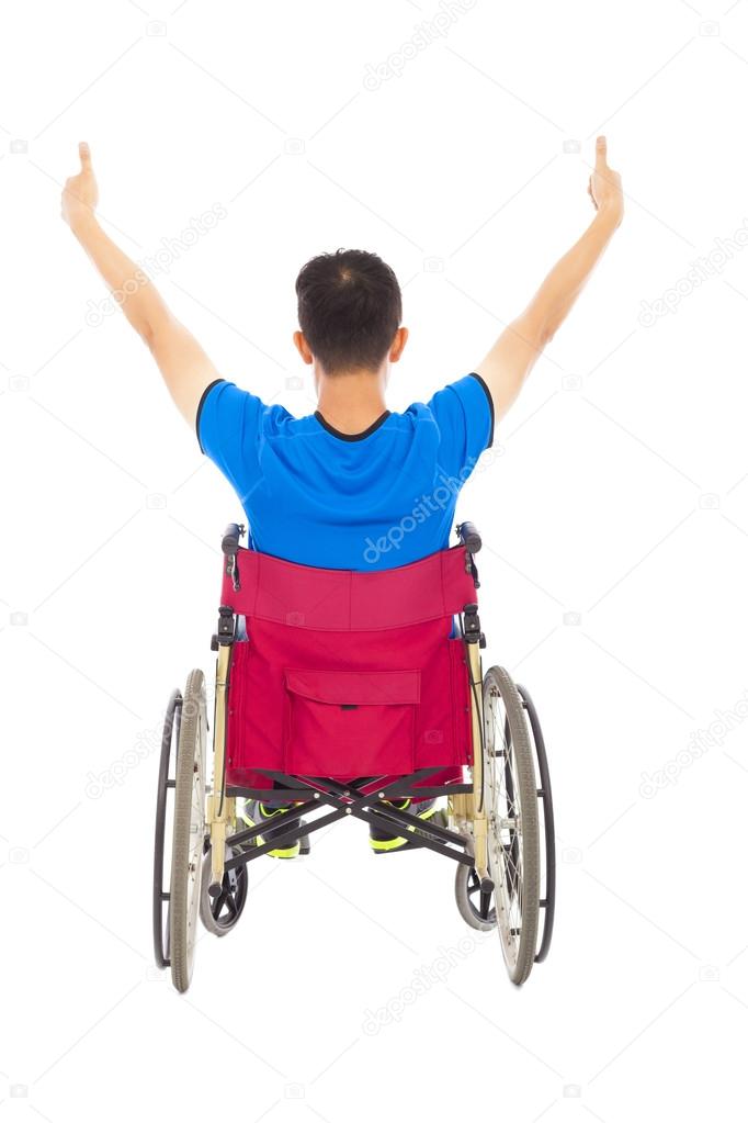 Handicapped man sitting on a wheelchair and thumb up — Stock Photo ...