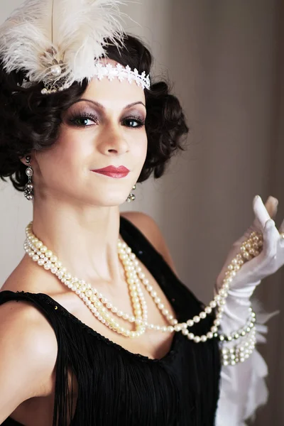 Retro flapper style woman Stock Photo by ©lenanet 23318574
