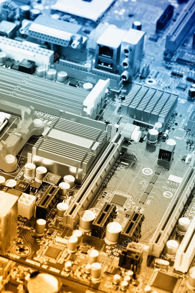Computer motherboard electrical components — Stock Photo © VIZAFOTO ...