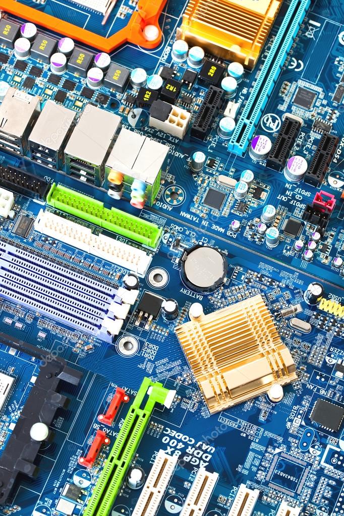 Computer motherboard electrical components Stock Photo by ©VIZAFOTO ...