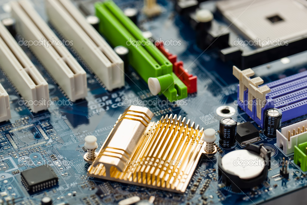 Computer motherboard electrical components — Stock Photo © VIZAFOTO ...