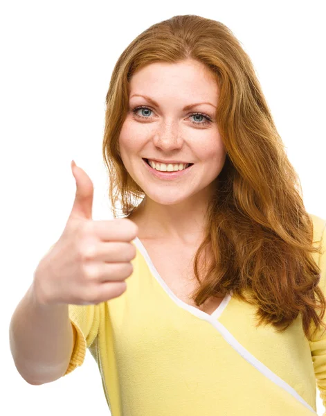 Woman showing thumbs up gesture, isolated — Stock Photo © g_studio ...