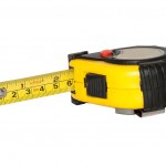 Tape measure isolated on white Stock Photo by ©seregam 12012917
