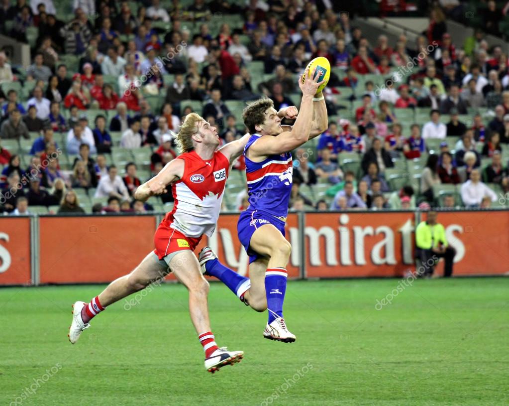 MELBOURNE - SEPTEMBER 12: Will Minson takes a strong mark in the AFL ...