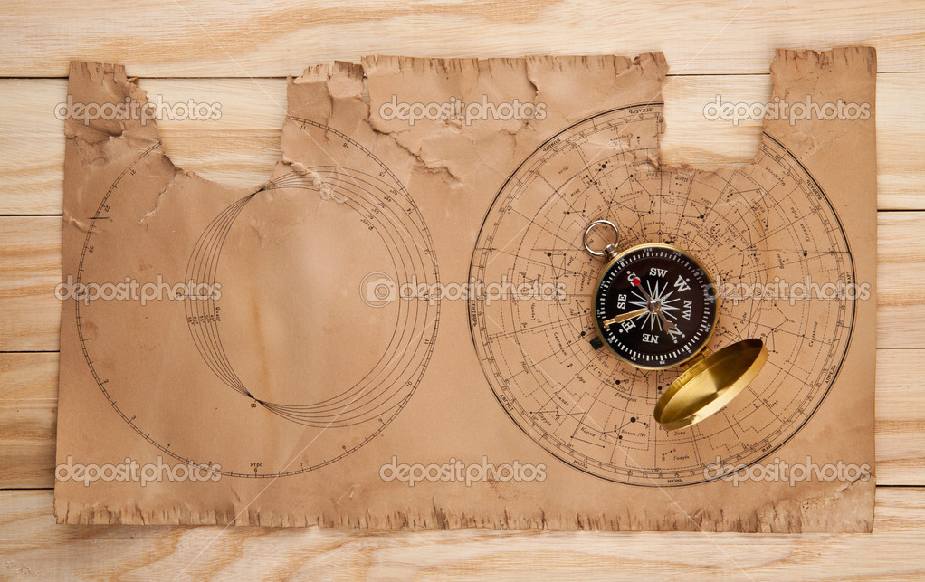 Old paper and compass Stock Photo by ©valzan 35914515