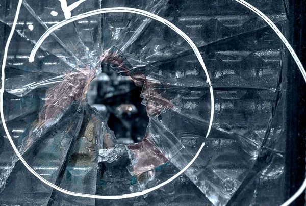 Broken window with a bullet hole in the middle - Stock Image - Everypixel