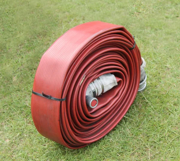 Red Fire Hose. - Stock Image - Everypixel