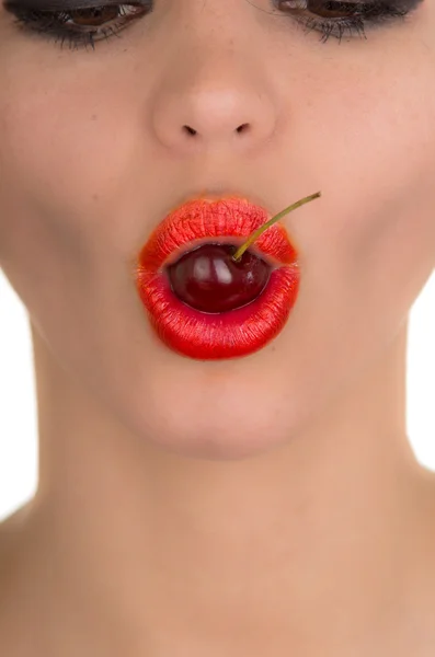 Red lips with a cherry. — Stock Photo © SergeyTay #83554244