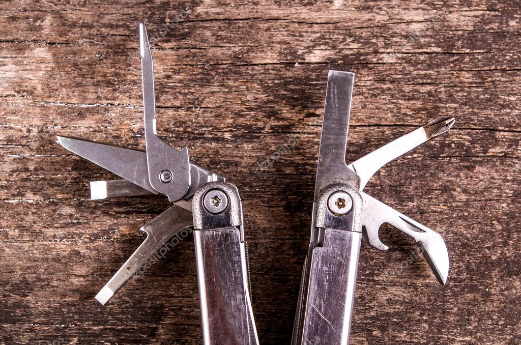 Multitool, multi purpose tool with plyers and knife — Stock Photo ...