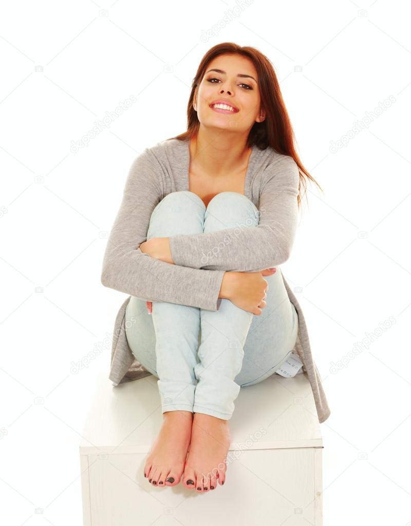 Woman sitting on white box — Stock Photo © Vadymvdrobot #31606977