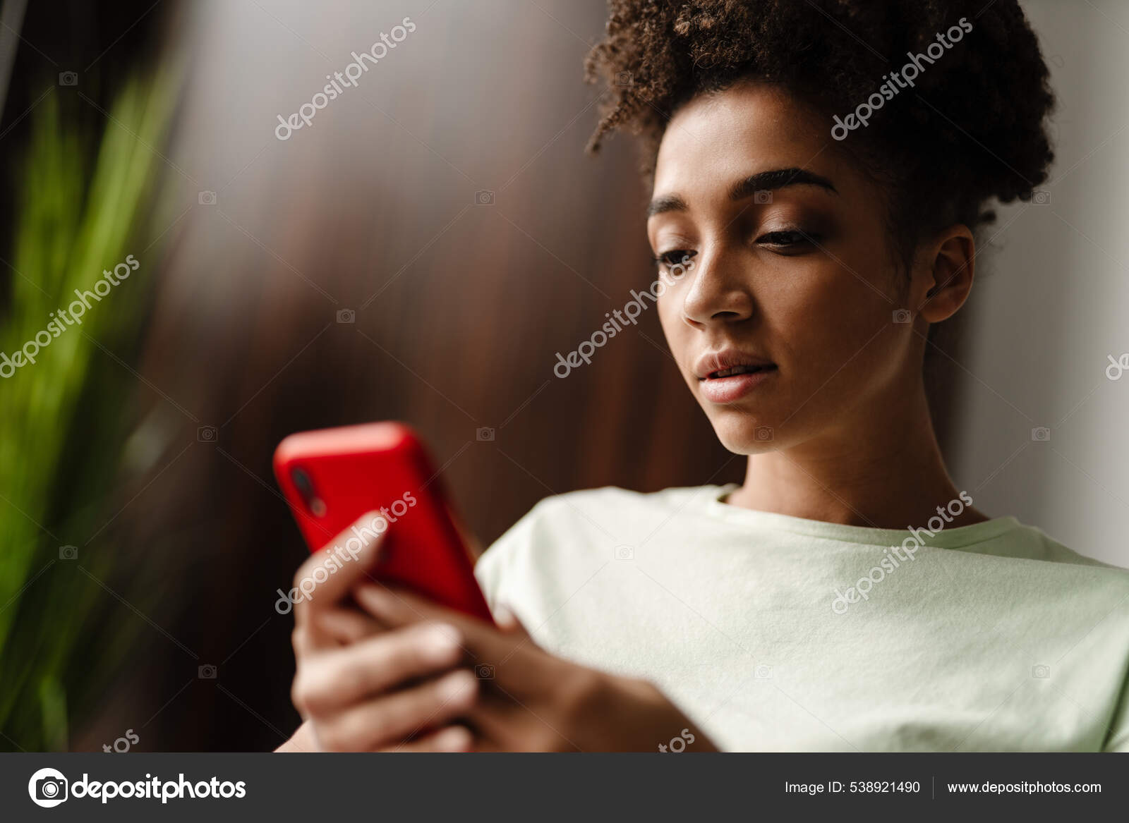 Young Black Woman Using Mobile Phone While Standing Home — Stock Photo ...