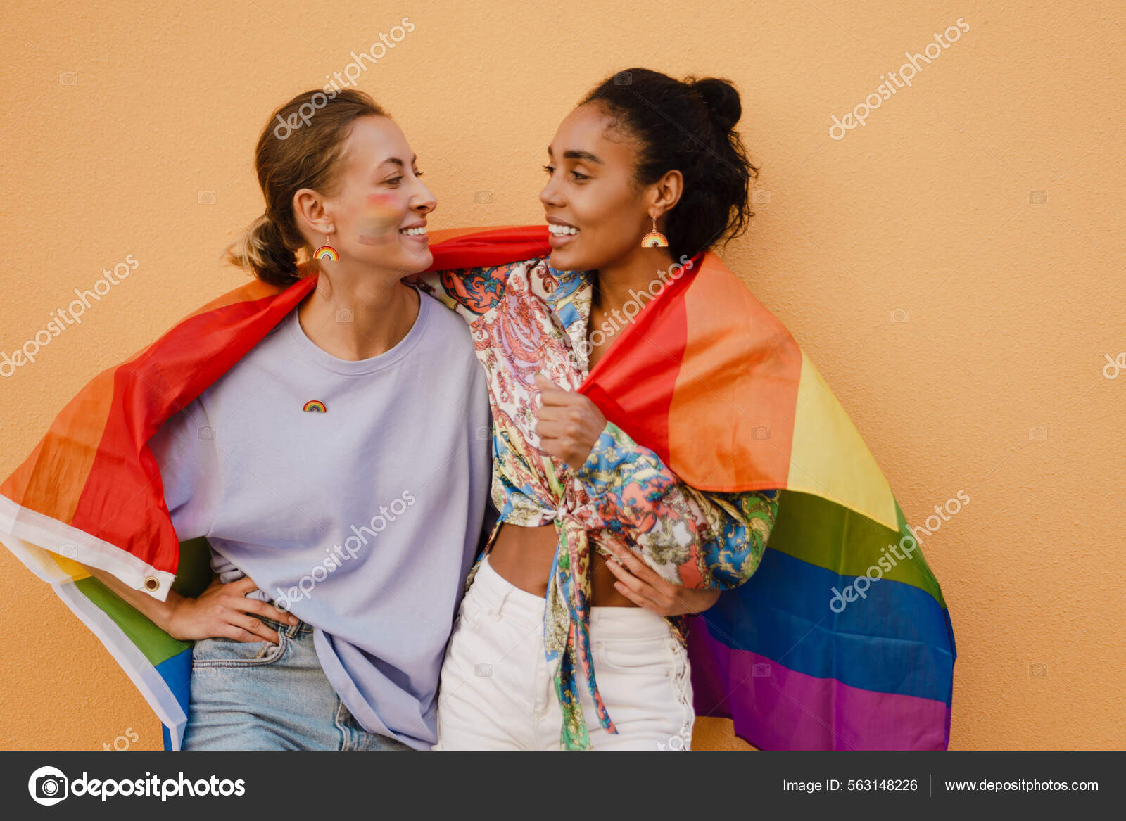 Young Lesbian Couple Wrapped Rainbow Flag Smiling While Standing Yellow ...