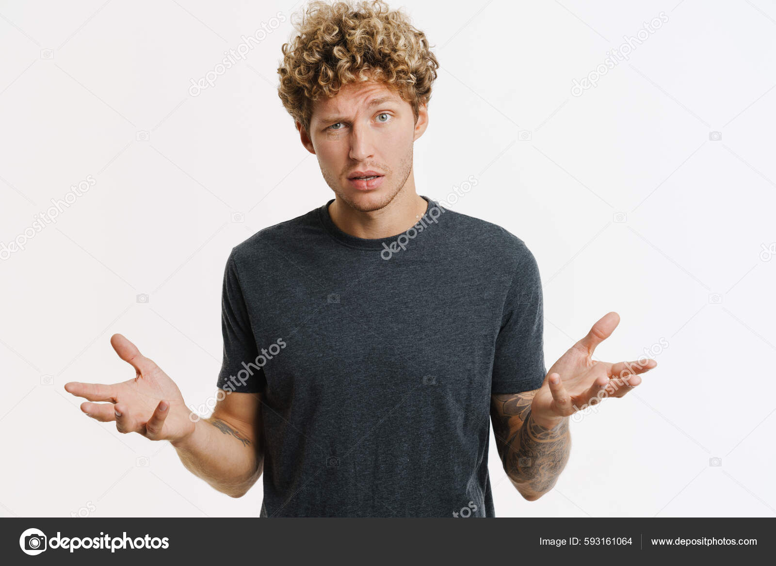 Young Perplexed Man Frowning Gesturing Camera Isolated White Wall ...