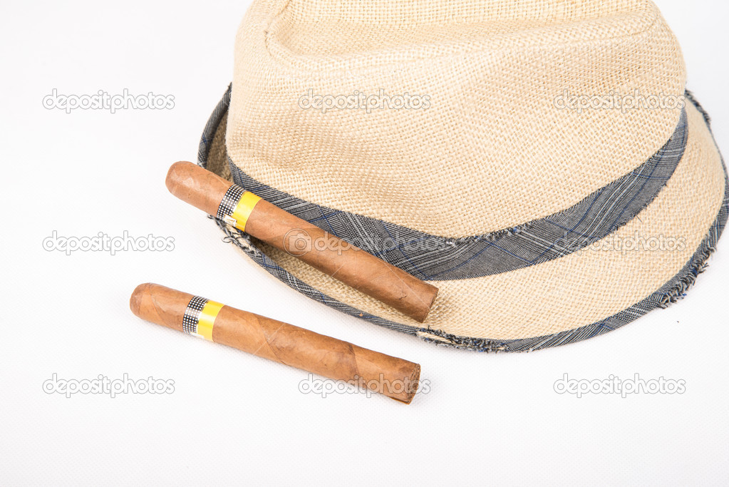 Cuban cigar and hat Stock Photo by ©merc67 50858517