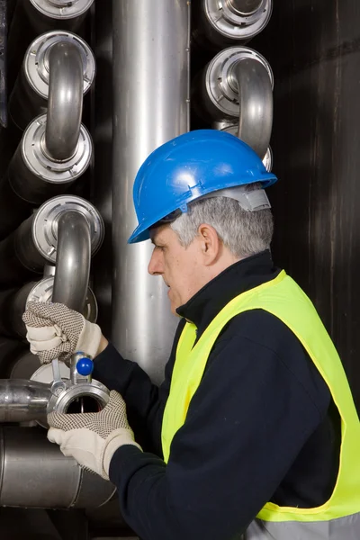 Heating engineer repairman in boiler room — Stock Photo © kalinovsky ...
