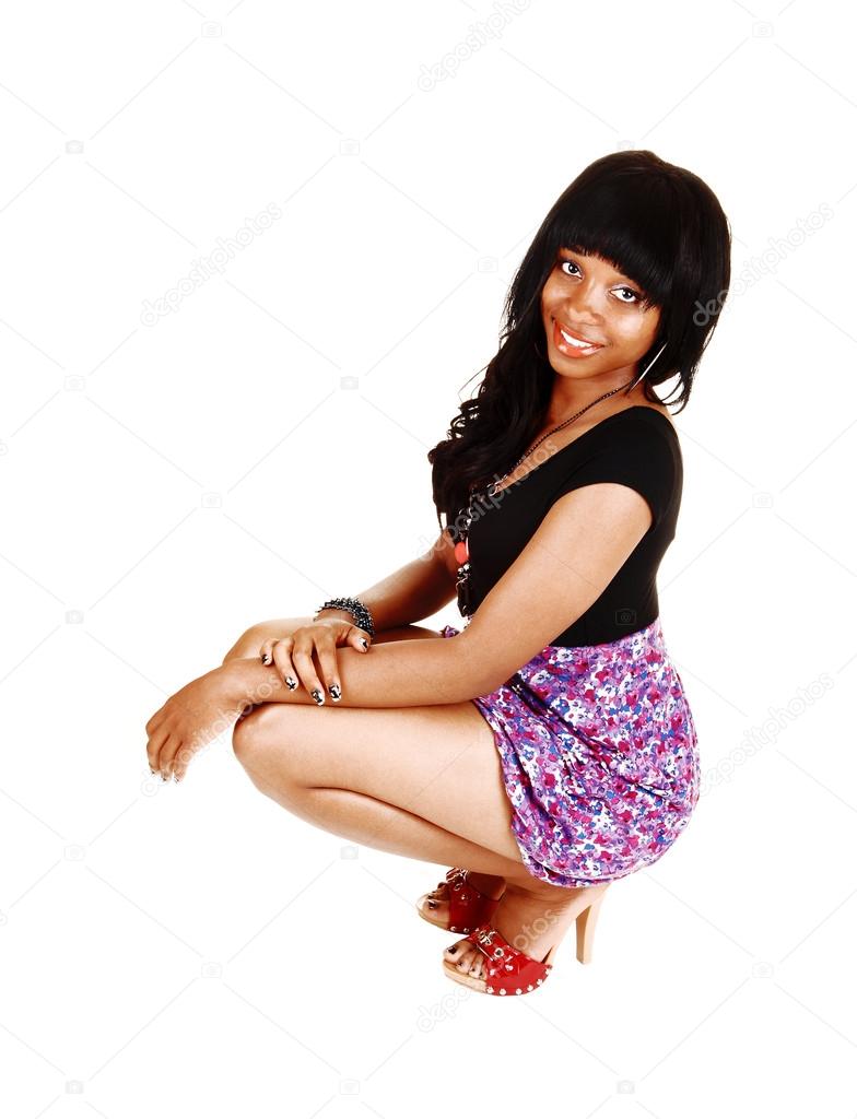 Crouching girl on floor. Stock Photo by ©sucher 14088553