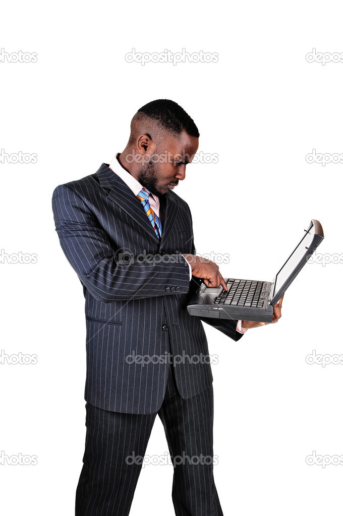 Black man with laptop. — Stock Photo © sucher #40106789