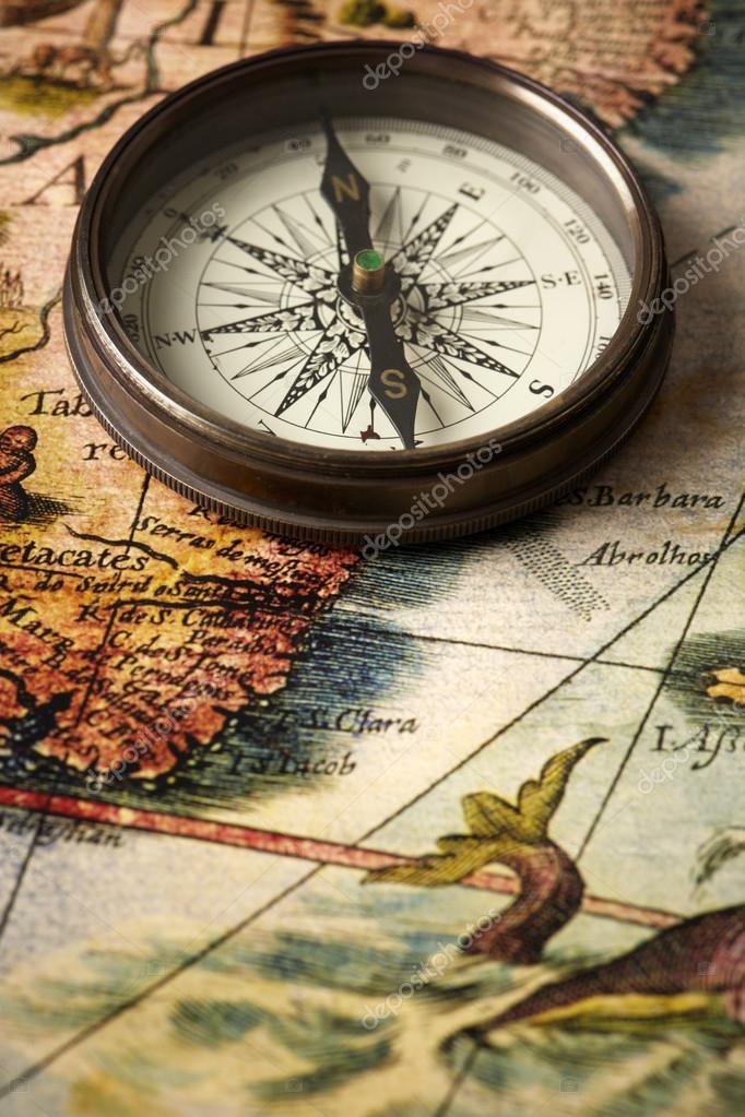 Vintage compass on a map — Stock Photo © Kuzmafoto #15818201
