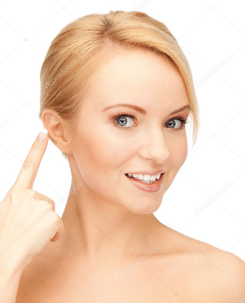 Beautiful woman pointing to ear — Stock Photo © Syda_Productions #12453267