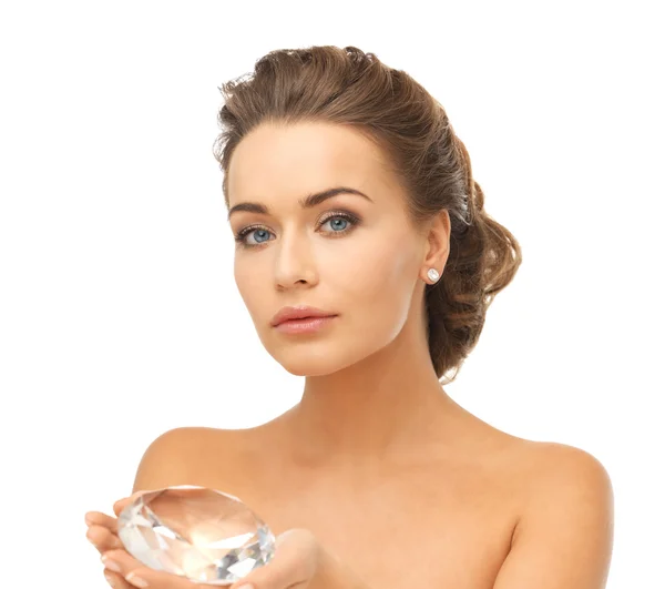 Woman showing big diamond Stock Photo by ©Syda_Productions 38734359
