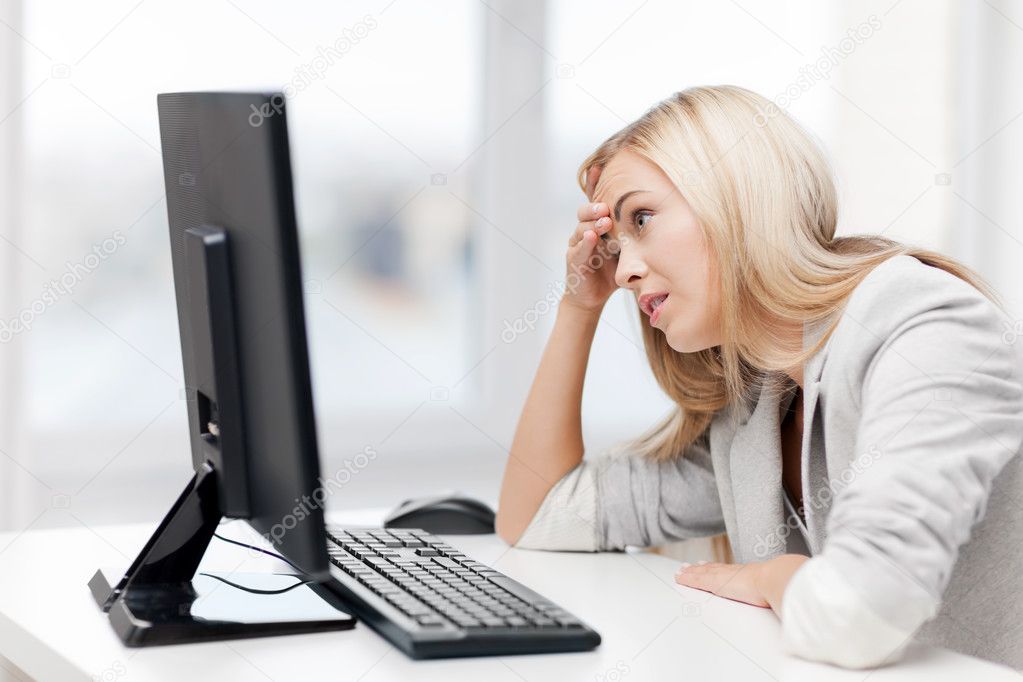 Stressed woman with computer — Stock Photo © Syda_Productions #25108601