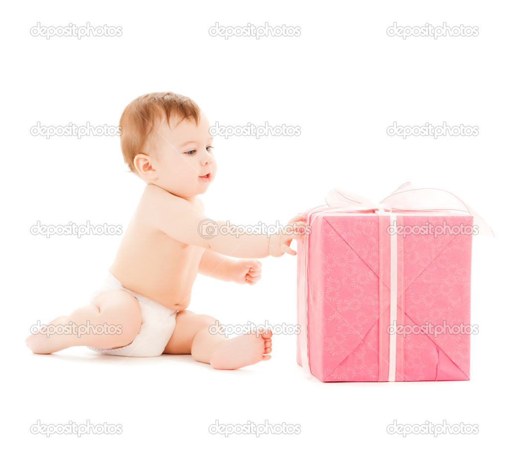 Happy child with gift box Stock Photo by ©Syda_Productions 26471211