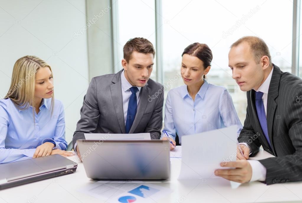 Business team with laptop having discussion — Stock Photo © Syda ...