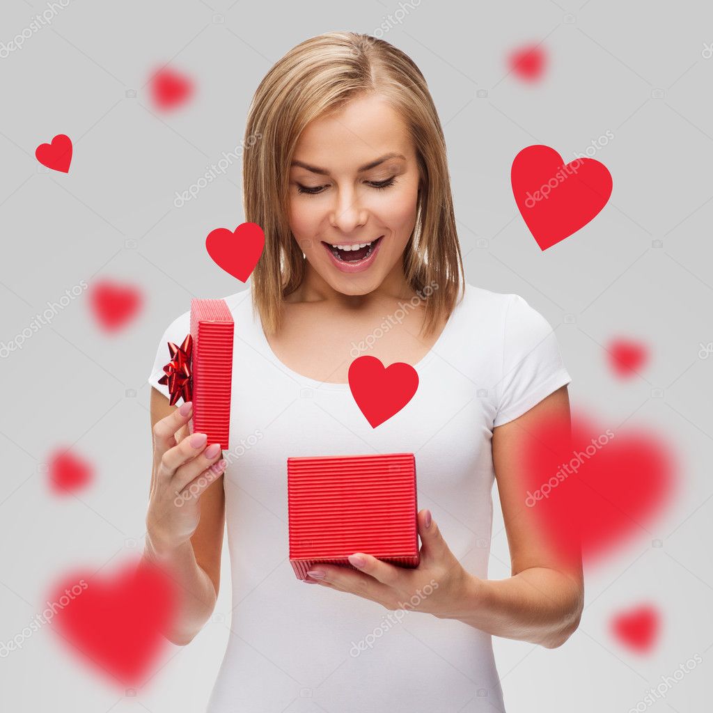 Happy girl with gift box — Stock Photo © Syda_Productions #39703681