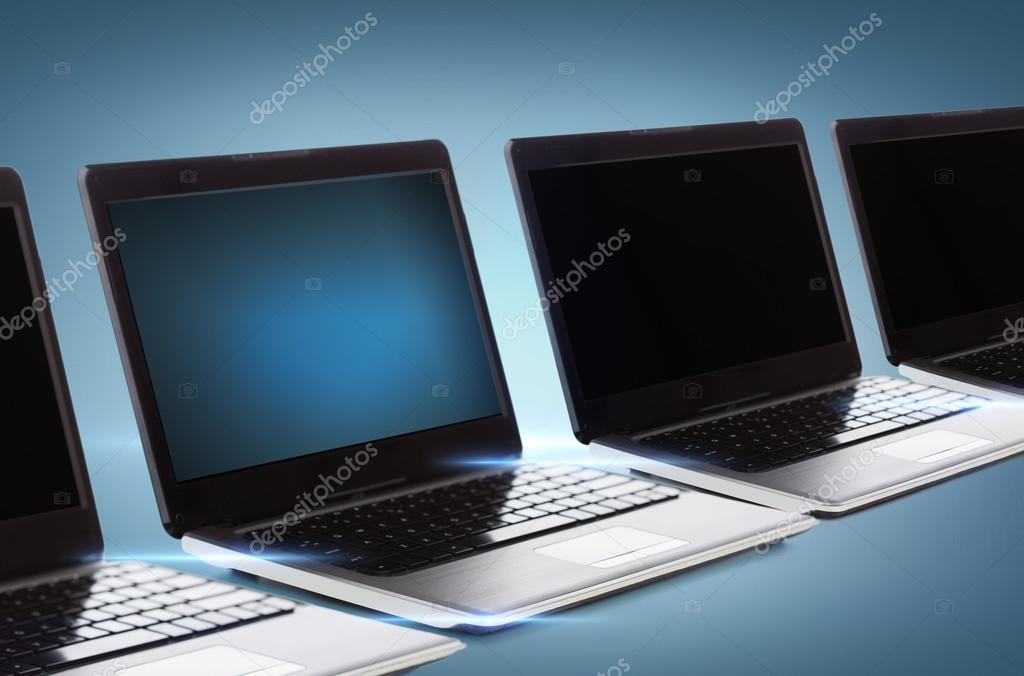 Many laptop computers with blank black screens — Stock Photo © Syda ...