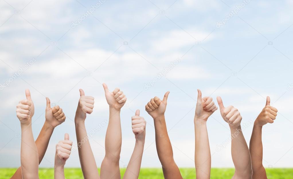 Human hands showing thumbs up — Stock Photo © Syda_Productions #41953841