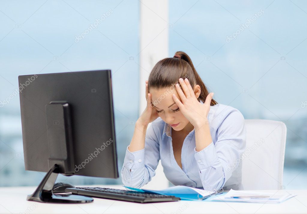 Stressed woman with computer and documents — Stock Photo © Syda ...